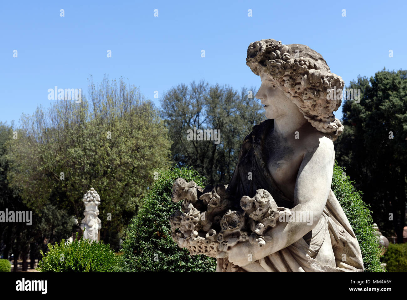 One of the many statues decorating the rear garden of the Galleria ...
