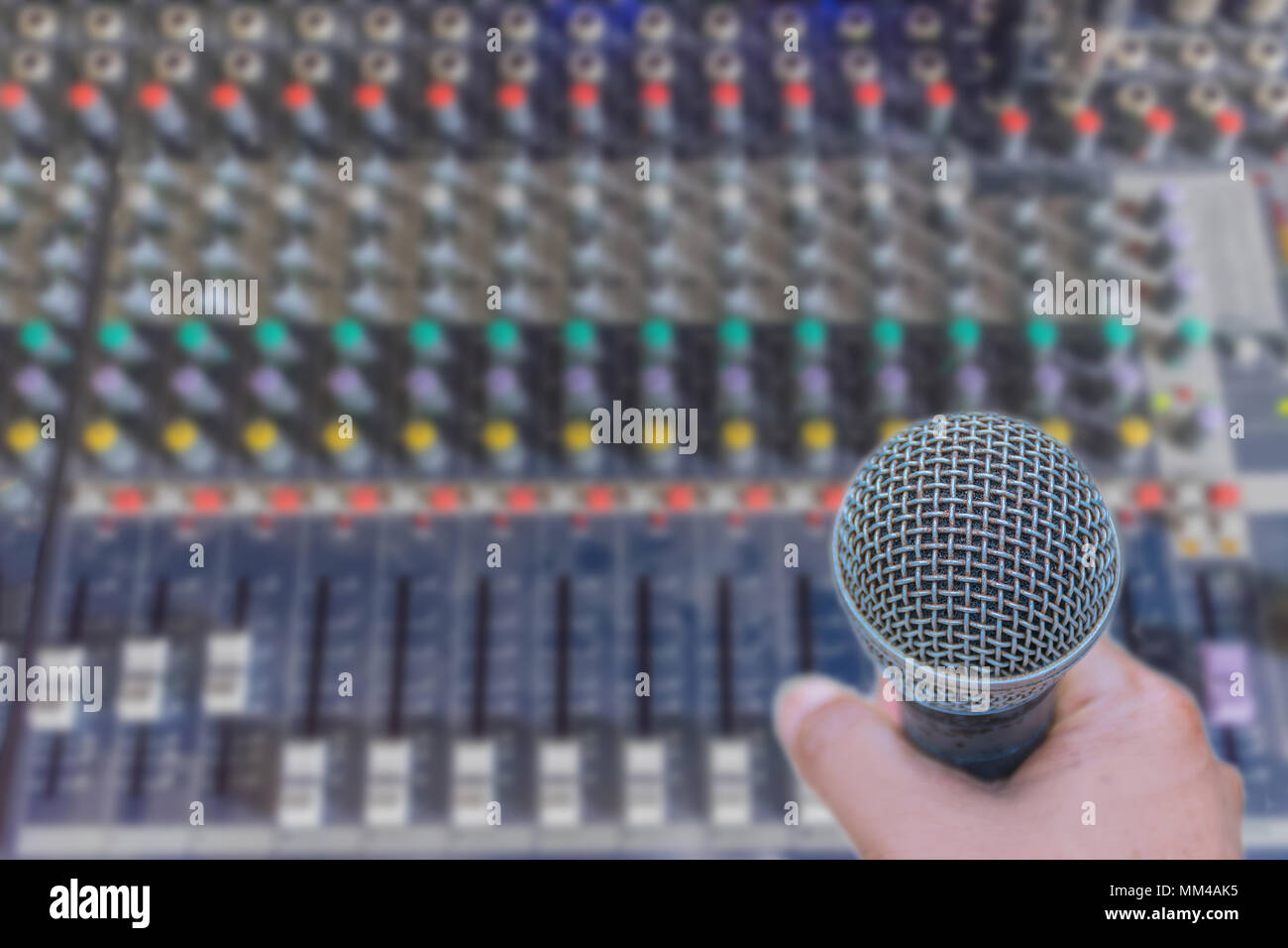 Abstract soft blurred and soft focus of microphone with controls of ...