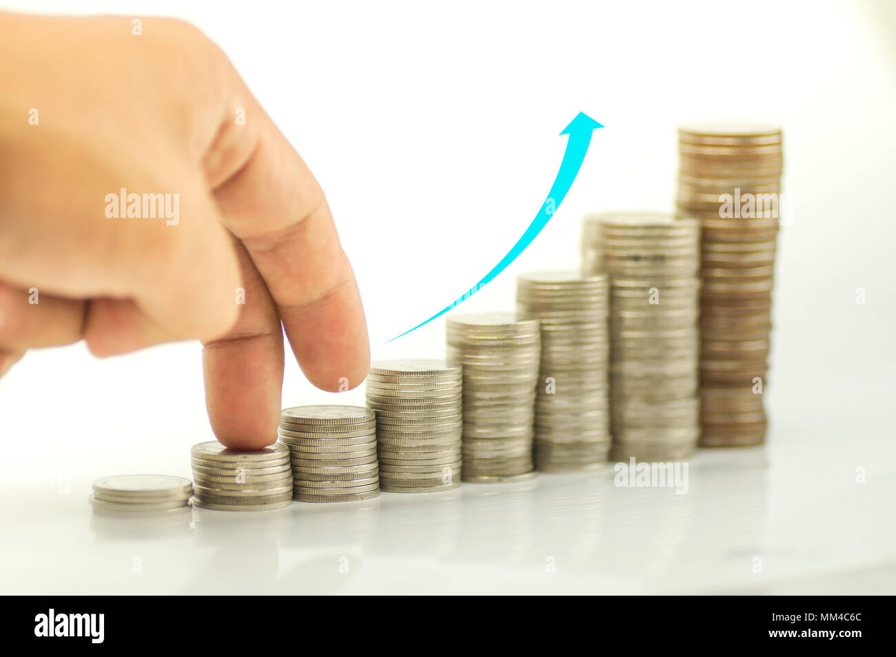 finger walk step by step on coins isolated on white background Stock ...