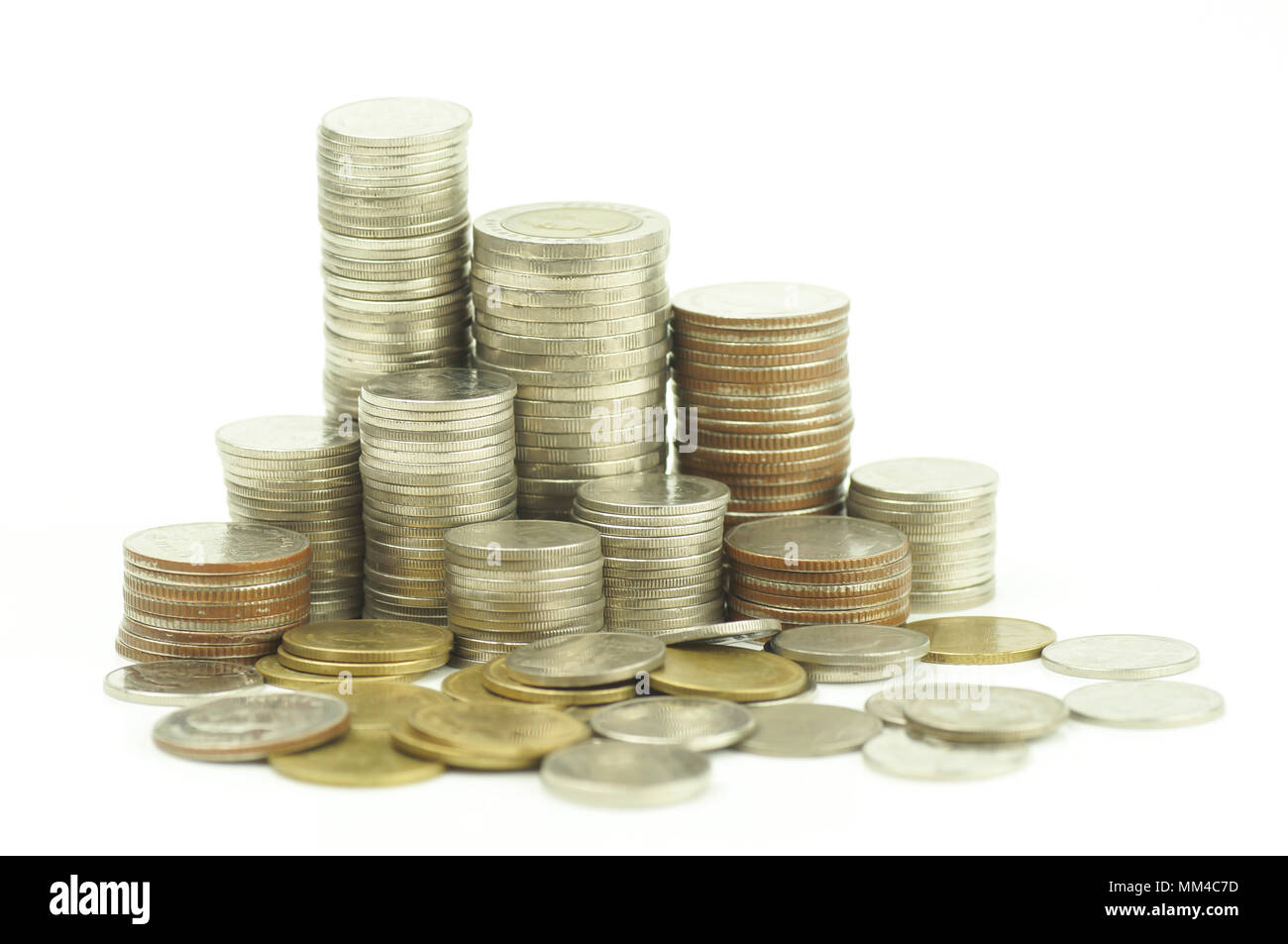 pile of money coins isolated on white background Stock Photo - Alamy