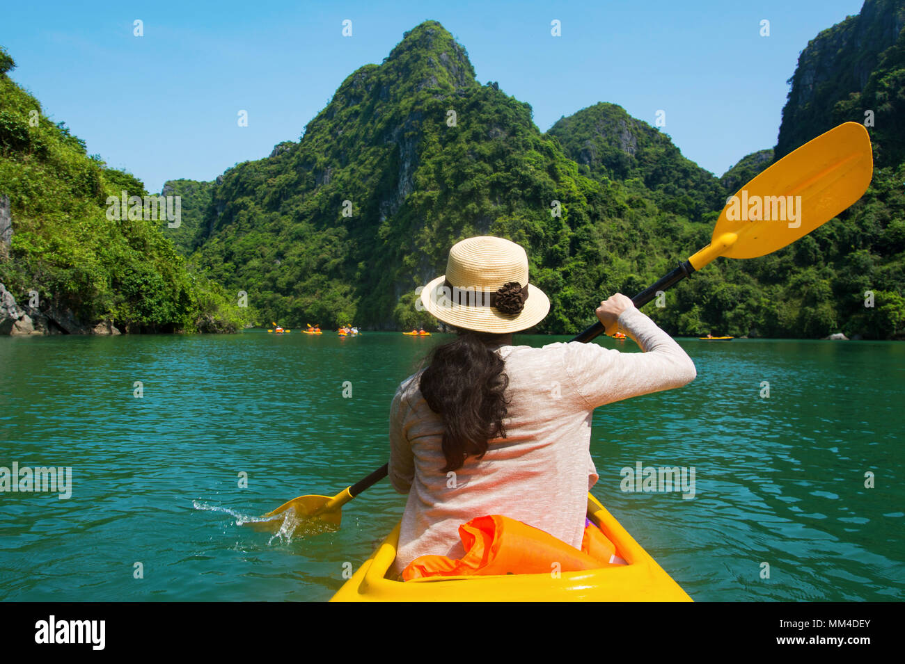 Tourist kayaking in the Halong bay seaside of Vietnam Stock Photo - Alamy