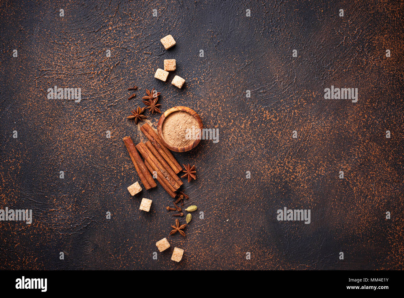 Cinnamon, anise, cardamom, clover and sugar Stock Photo - Alamy