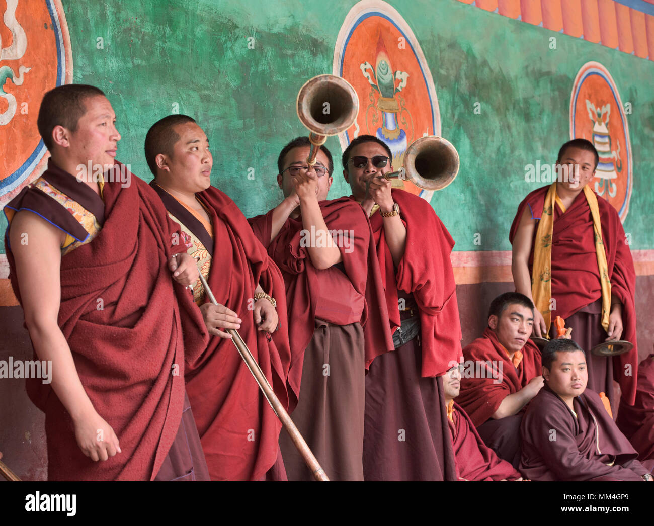 Tibetan monks play hi-res stock photography and images - Alamy