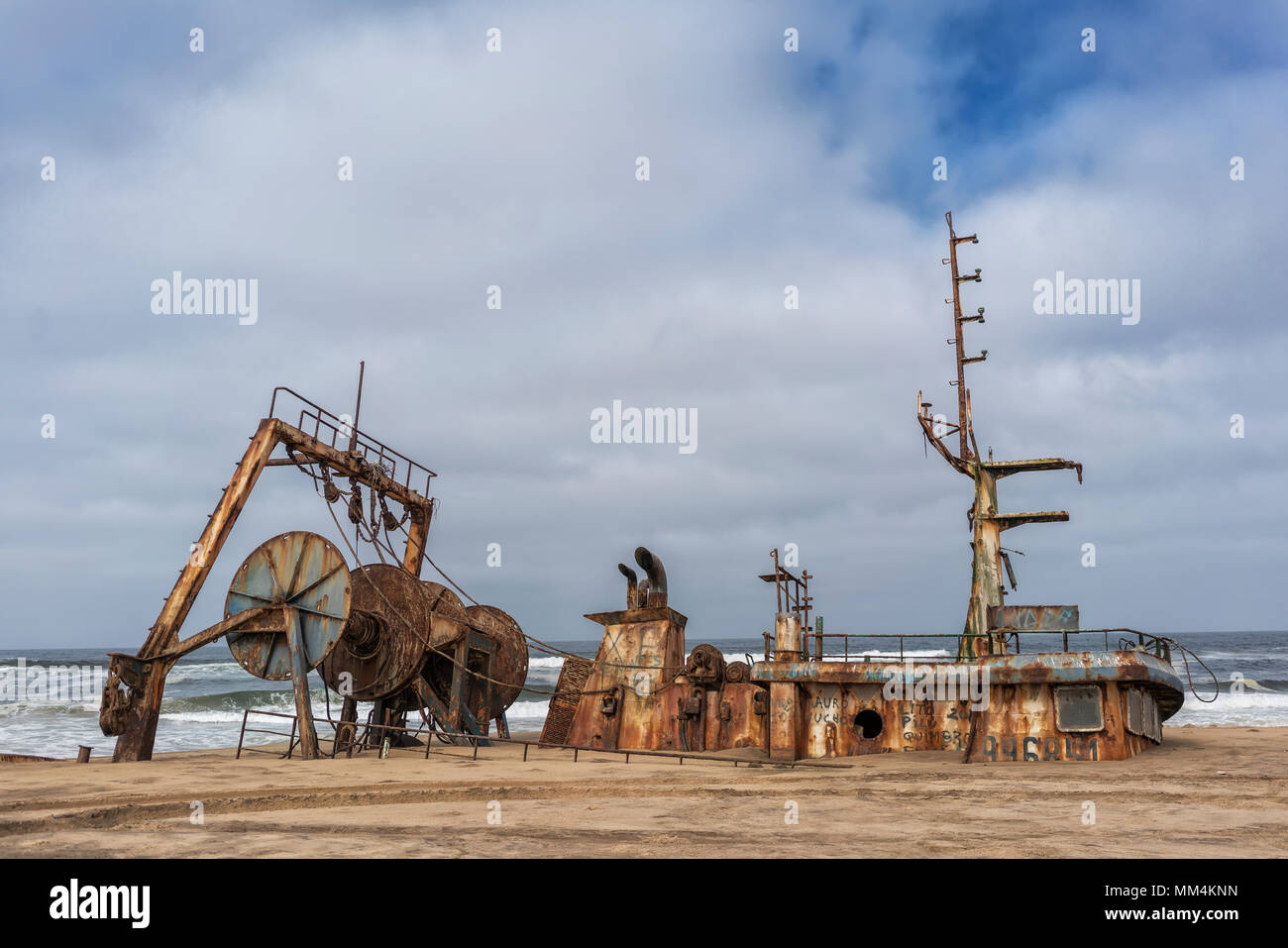 Ship wrecked and buried and abandoned on the coast of the Namibe Desert ...