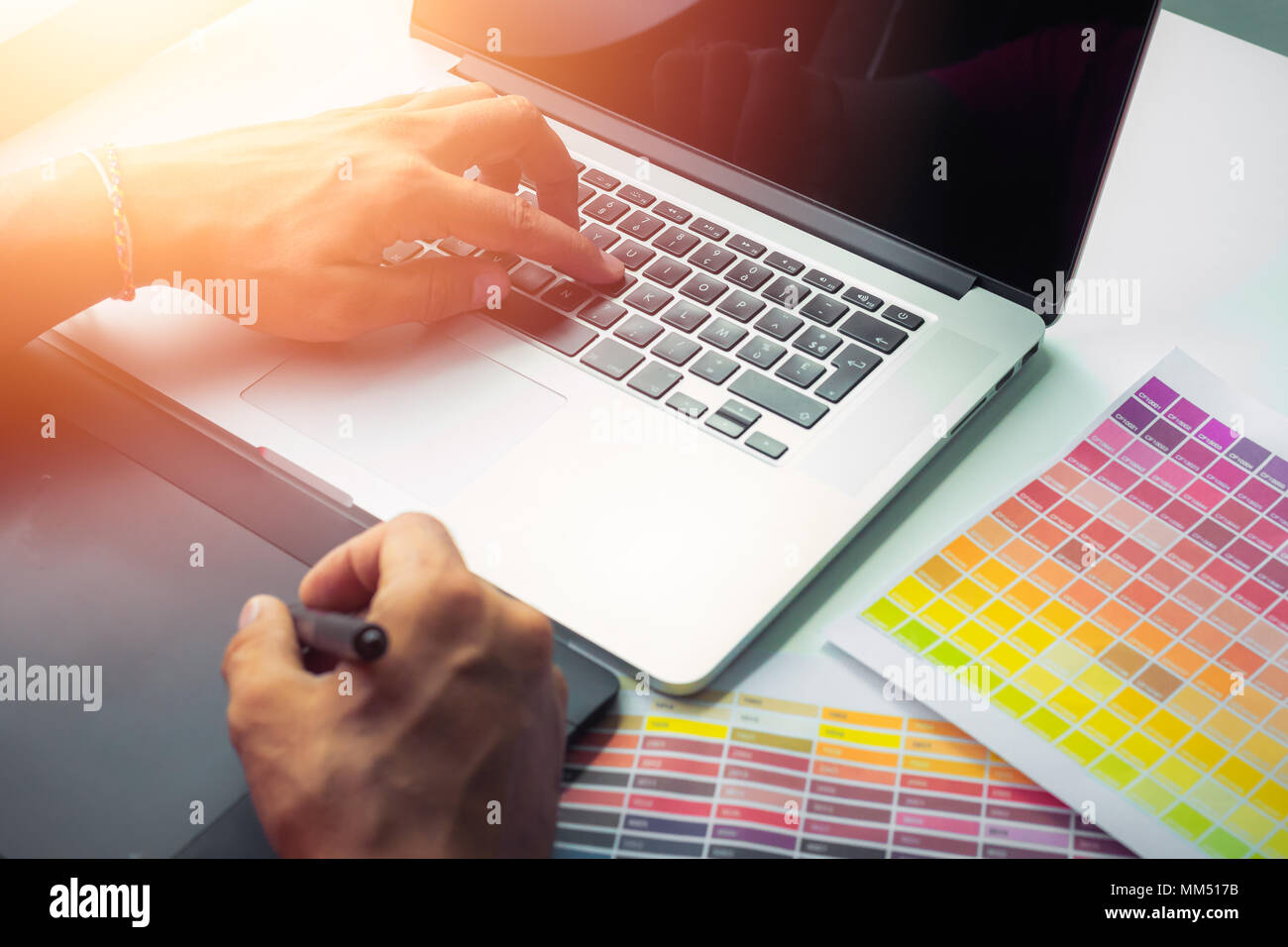 designer hand working with new modern computer laptop and pro digital ...