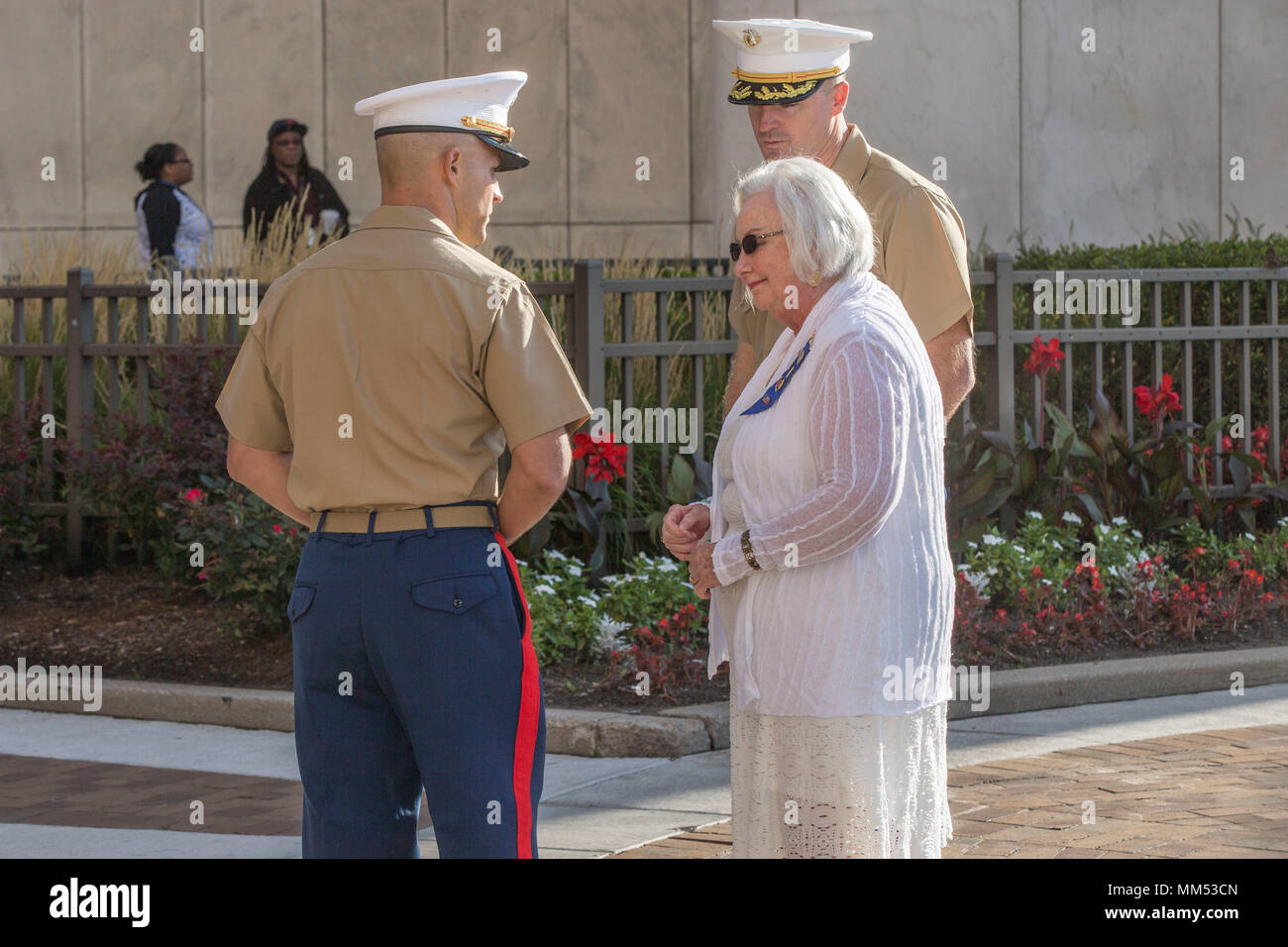 Evelyn Burgess, center, the mother of U.S. Marine Corps Sgt. Brian K ...