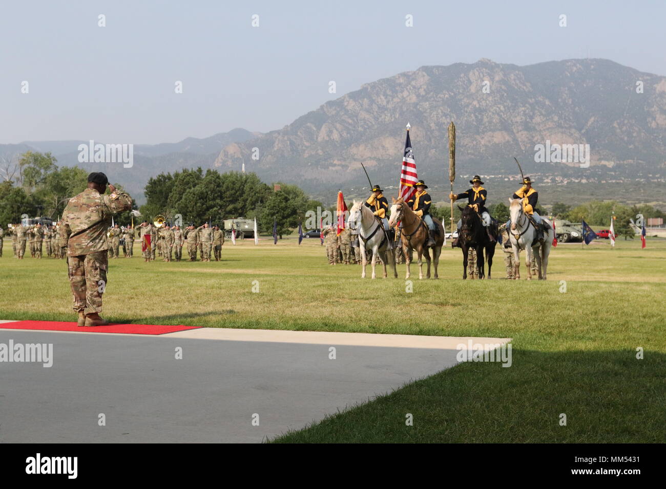 Col. Frank Davis II, 71st Ordnance Group (EOD) commander, renders a ...