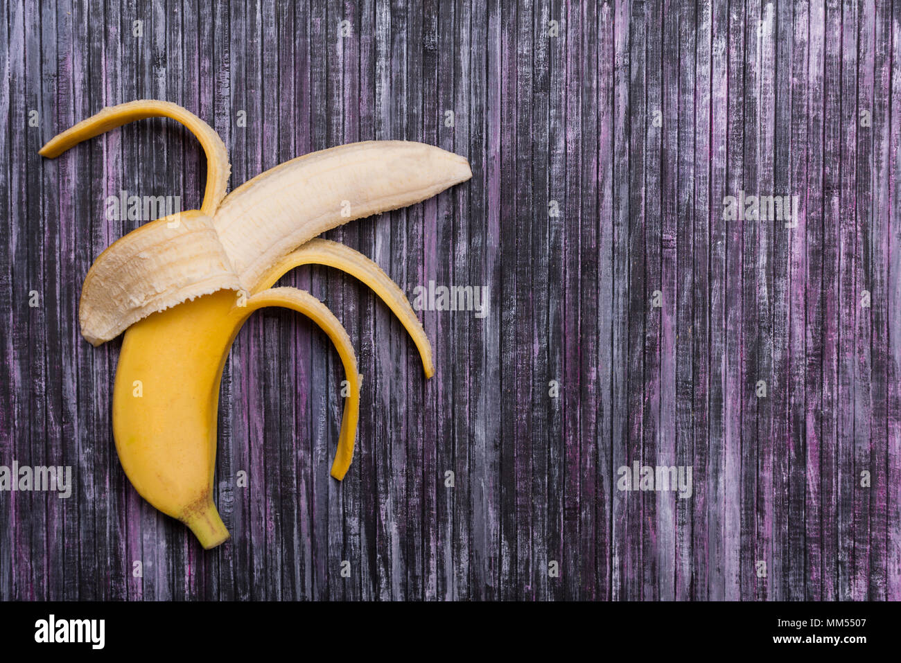 Banana on a wooden background. Useful fruit. Summer. Vacation. Fruit on ...