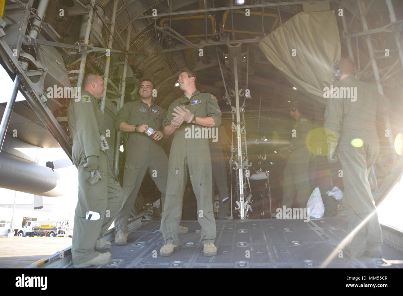 Chief Master Sgt. Daniel Hallman (left), Airman 1st Class John Elliot ...
