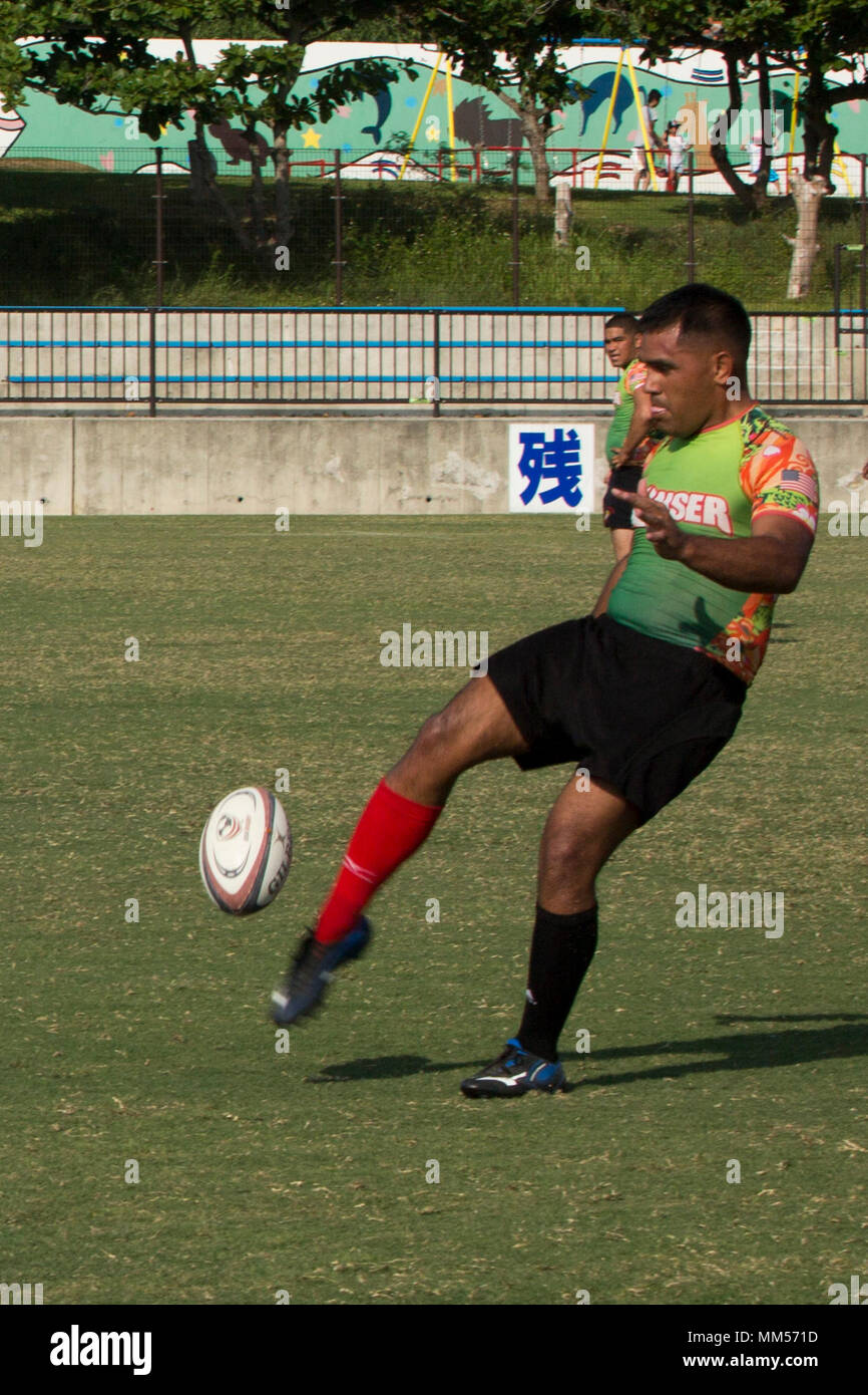 YOMITAN, OKINAWA, Japan— A Camp Kinser Dragons’ player kicks the ball ...