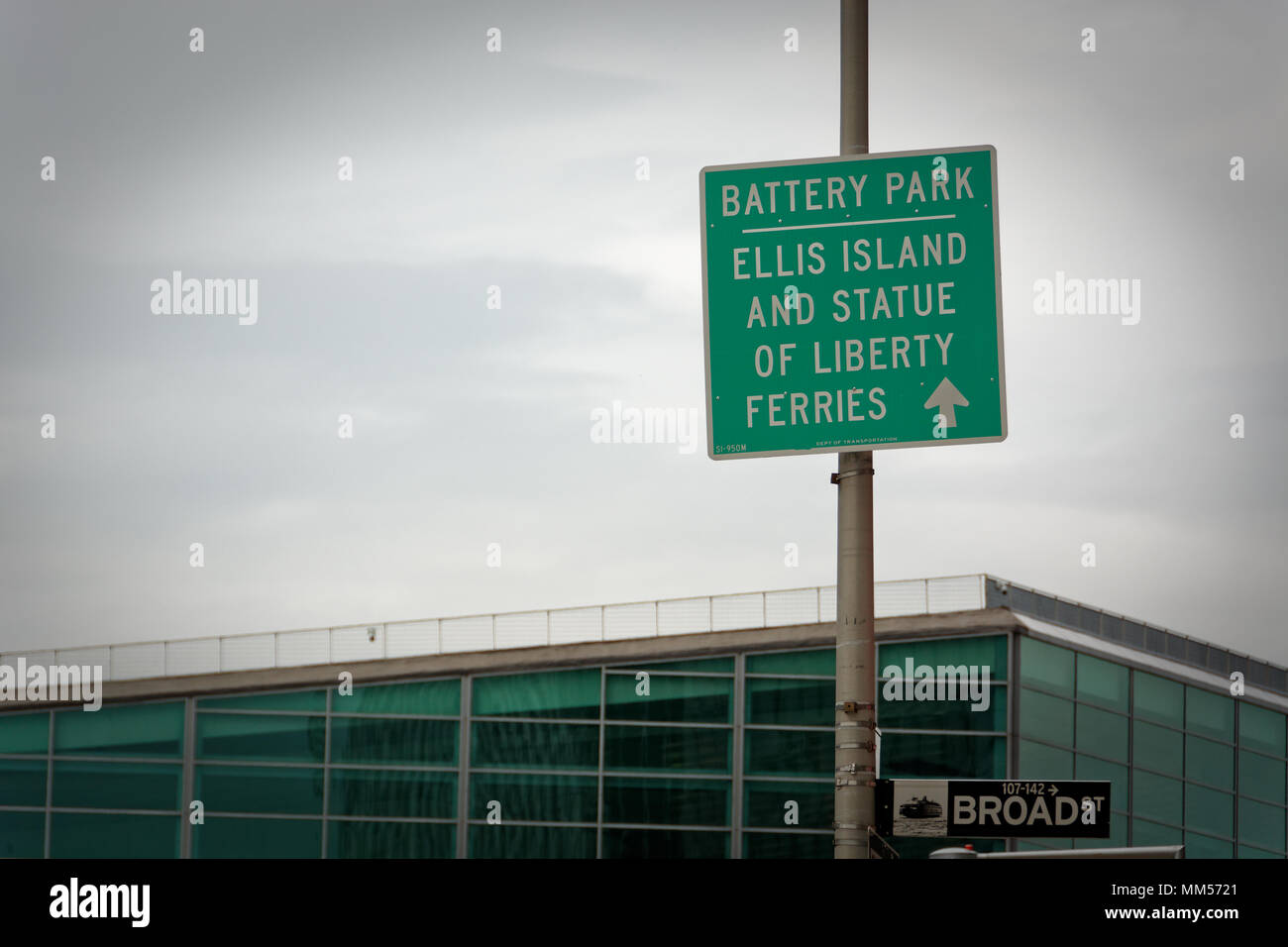 Sign showing the gates for Ellis island and Liberty Island Stock Photo ...