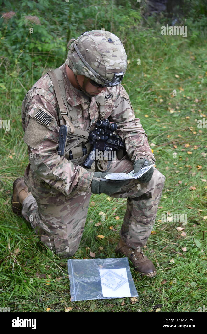 U.S. Army Staff Sgt. Nicholas Rouse, assigned to Company C, 1st ...