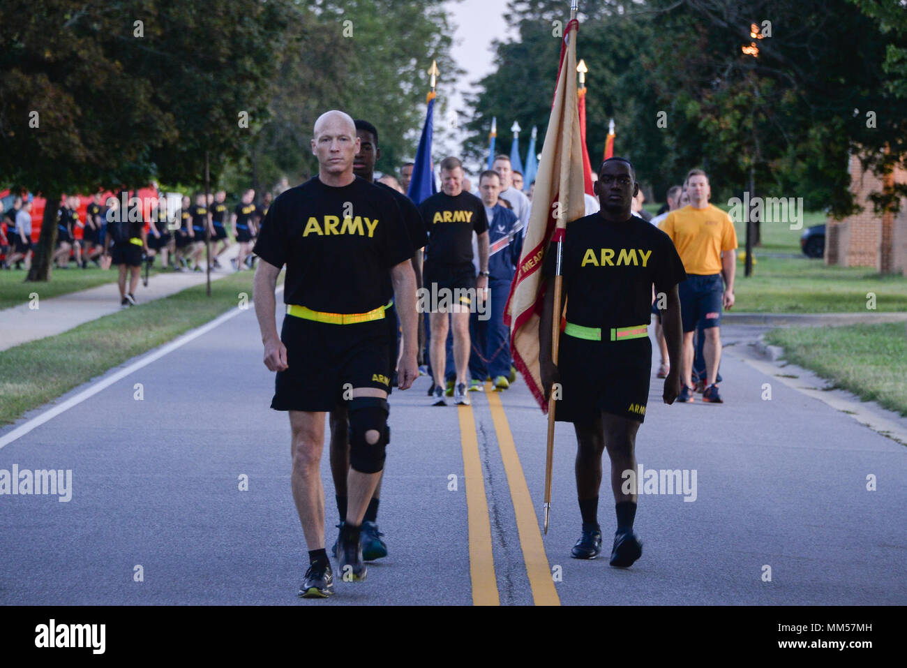 Installation Commander Col. Tom S. Rickard leads the start of the Fort ...