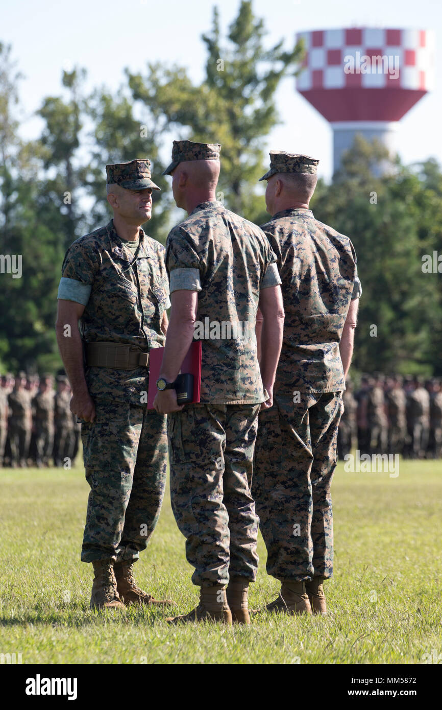 U.S. Marine Corps Col. Andrew M. Miller, left, outgoing commanding ...