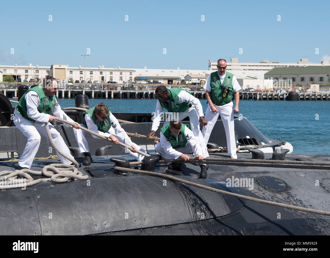 170908-N-KV911-0056 PEARL HARBOR (Sept. 8, 2017) Sailors prepare the ...