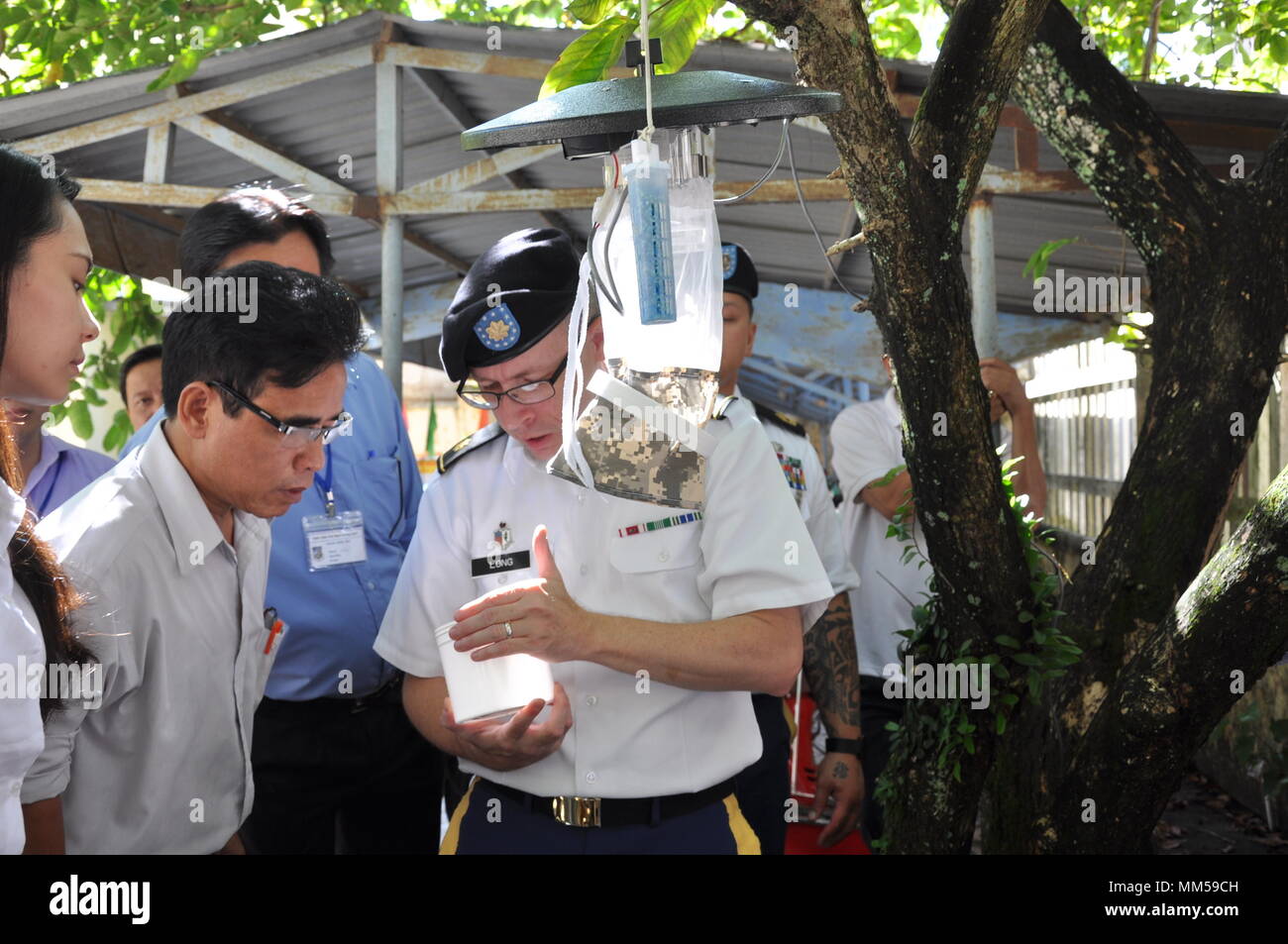 U.S. Army Maj. Lewis Long, an entomologist with U.S. Army Public Health ...