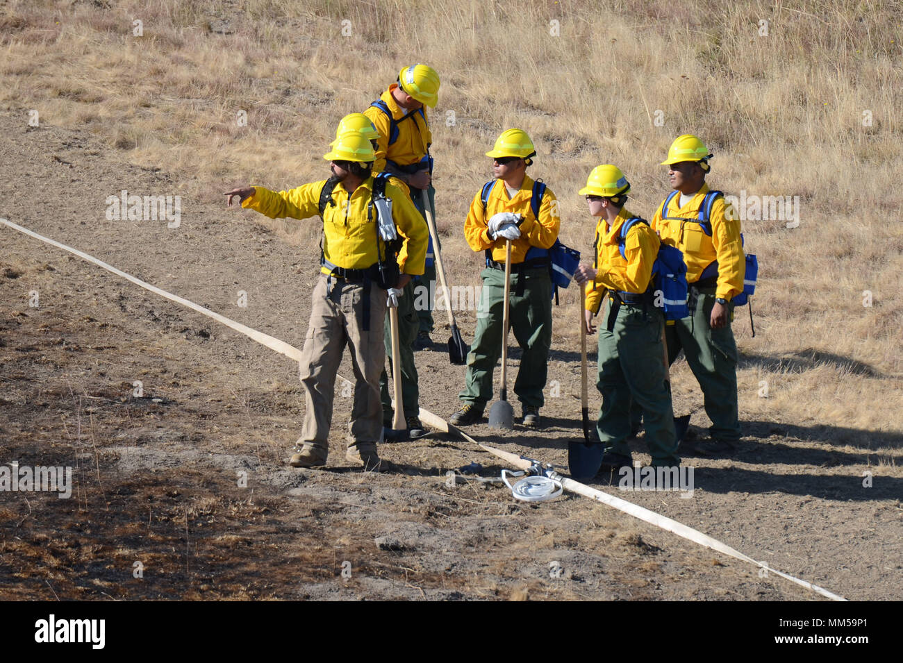 Oregon National Guard Soldiers and Airmen use water streams on hotspots ...