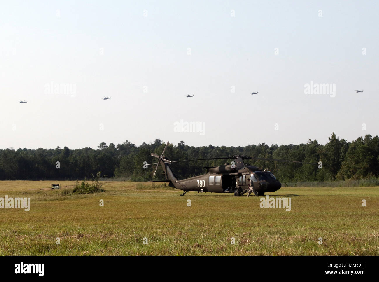 A flight of UH-60M Black Hawks descend on Camp Shelby Joint Force ...