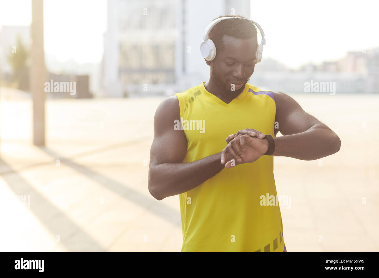 Closeup portrait of african man with berfect body. After jogging counts ...