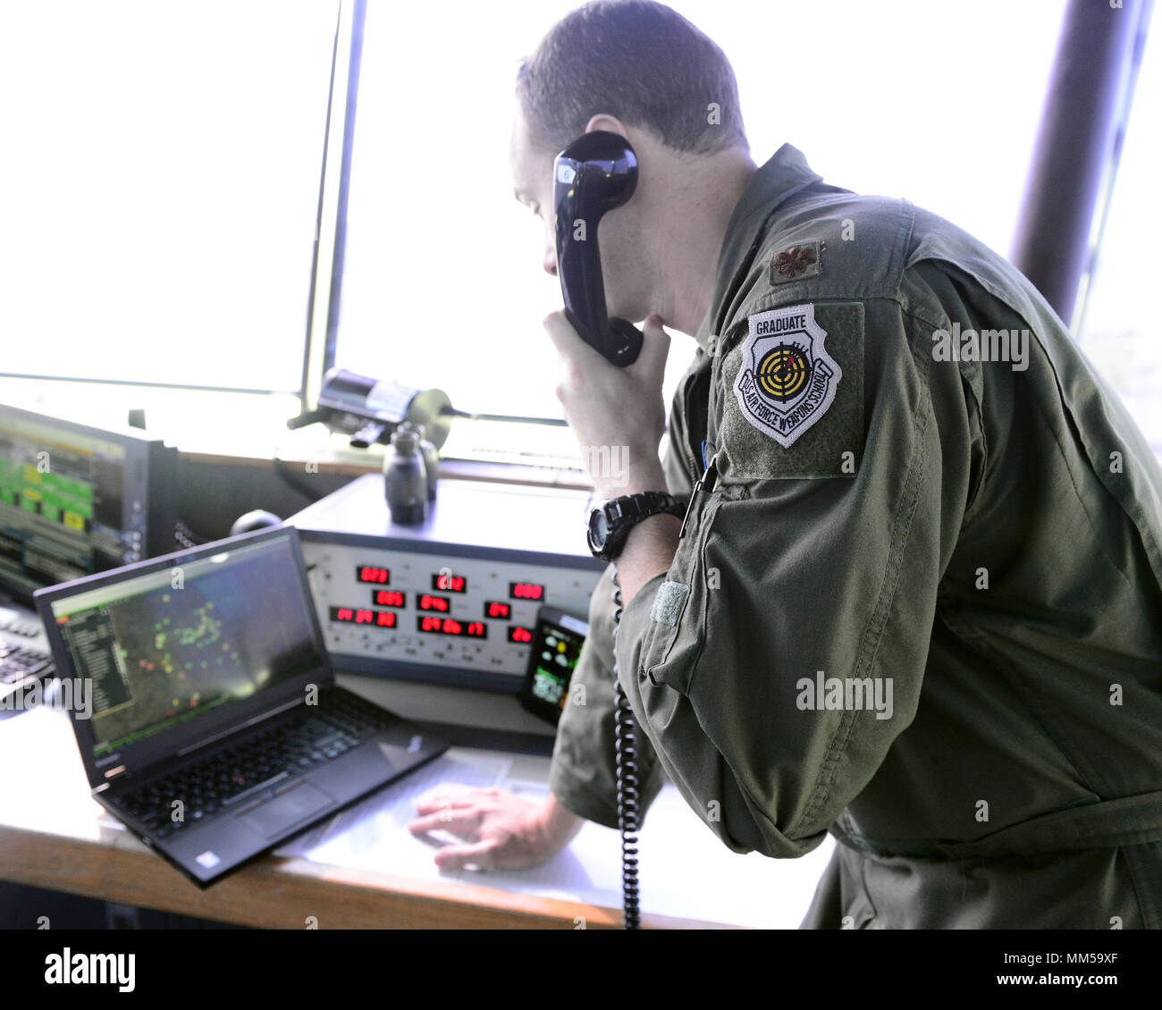 Major Travis Williams, 111th Attack Squadron, coordinates communication ...