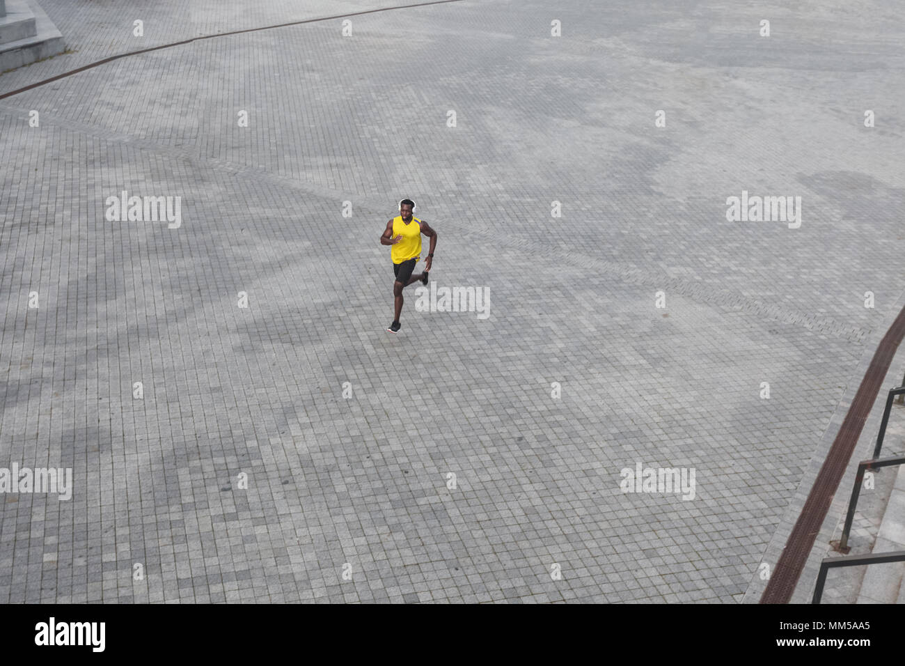 View from above. Sporty african man running at the morning.. Outdoor ...