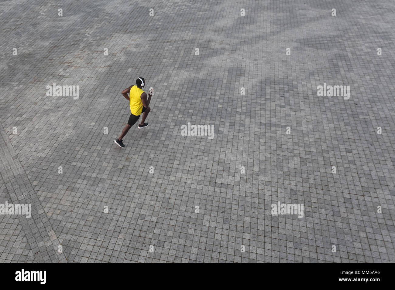 African american man running hi-res stock photography and images - Alamy