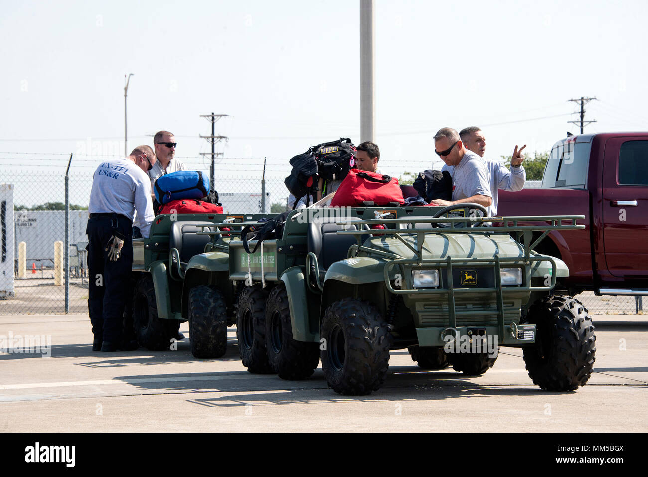 Personnel from Texas Task Force 1 Search and Rescue ready their gear ...