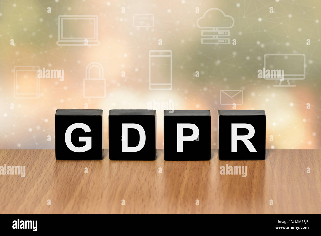 GDPR on black block with digital icon and blurred background Stock ...