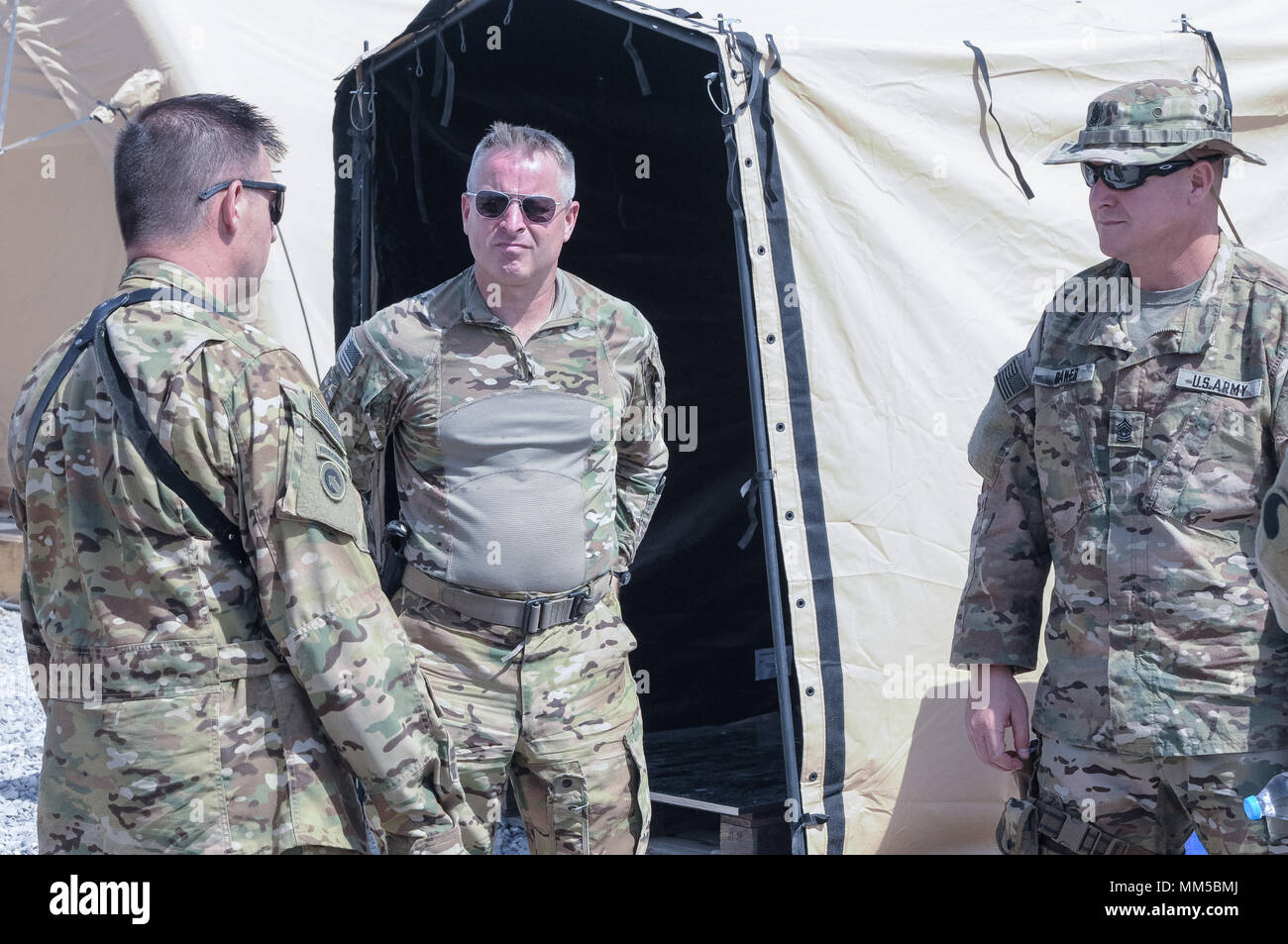 Col. Mark Beckler (left), 29th Combat Aviation Brigade commander, meets ...