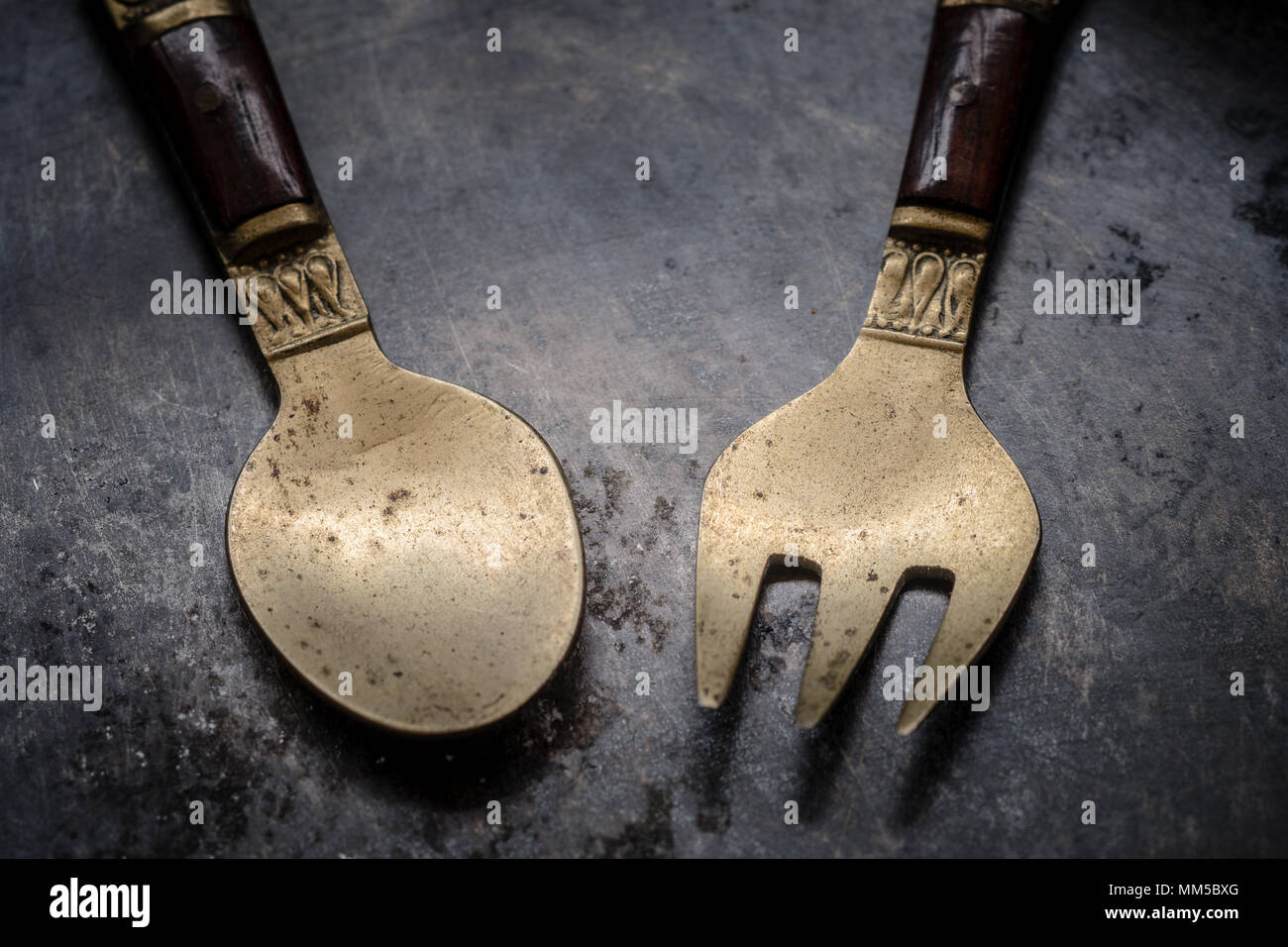 Tarnished spoons hi-res stock photography and images - Alamy