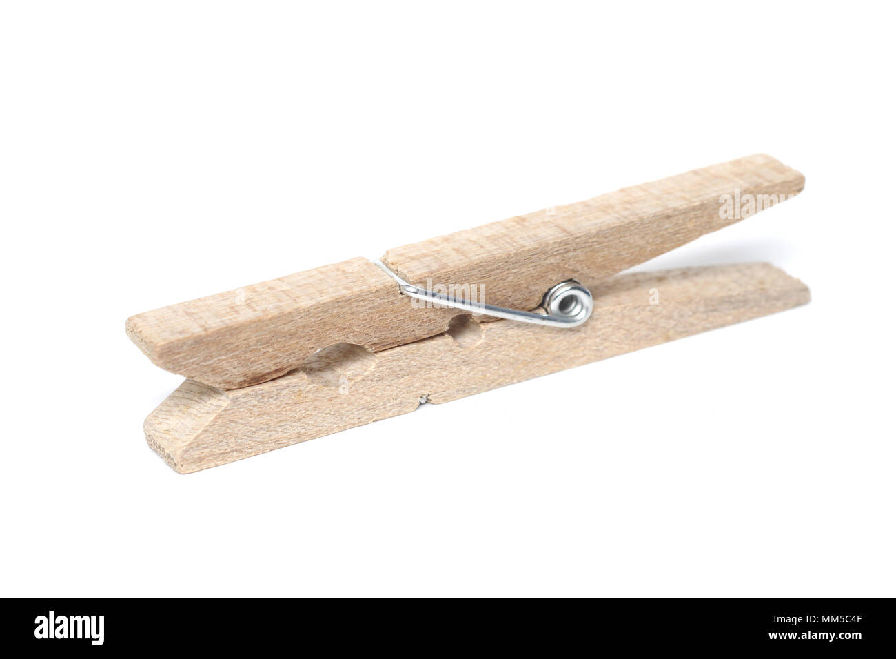 Wooden clothes peg isolated on a white background Stock Photo - Alamy
