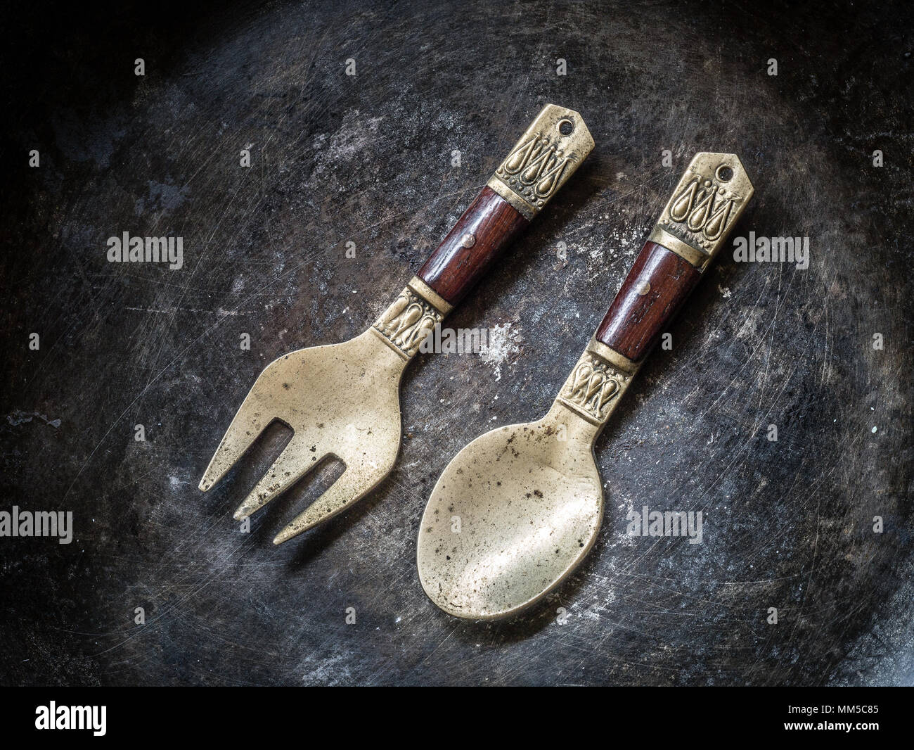 Tarnished spoons hi-res stock photography and images - Alamy