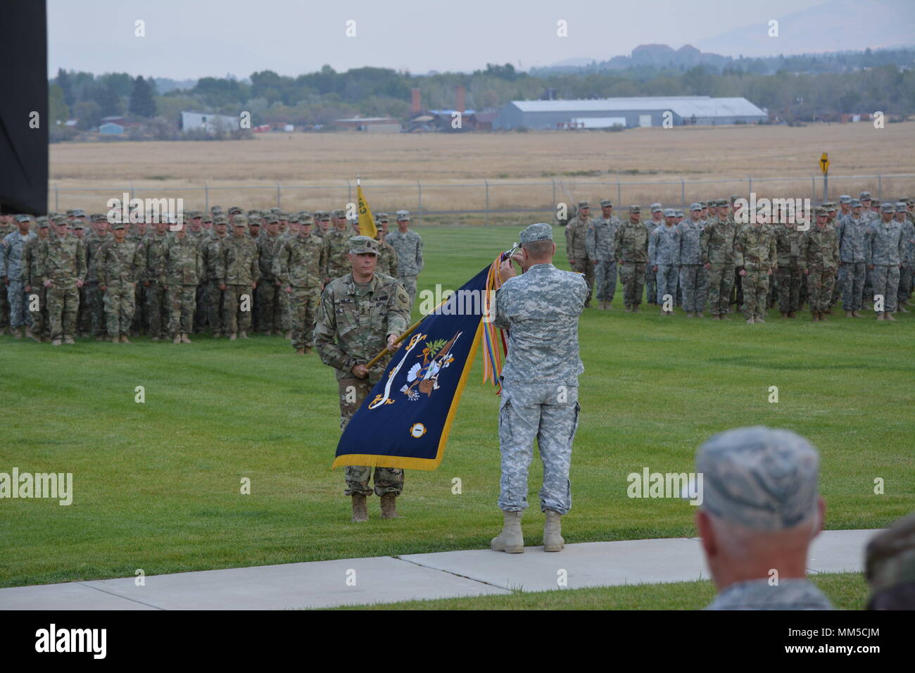 Sgt. Maj. William Frank lowers the battalion colors for Maj. Sean Hardy ...