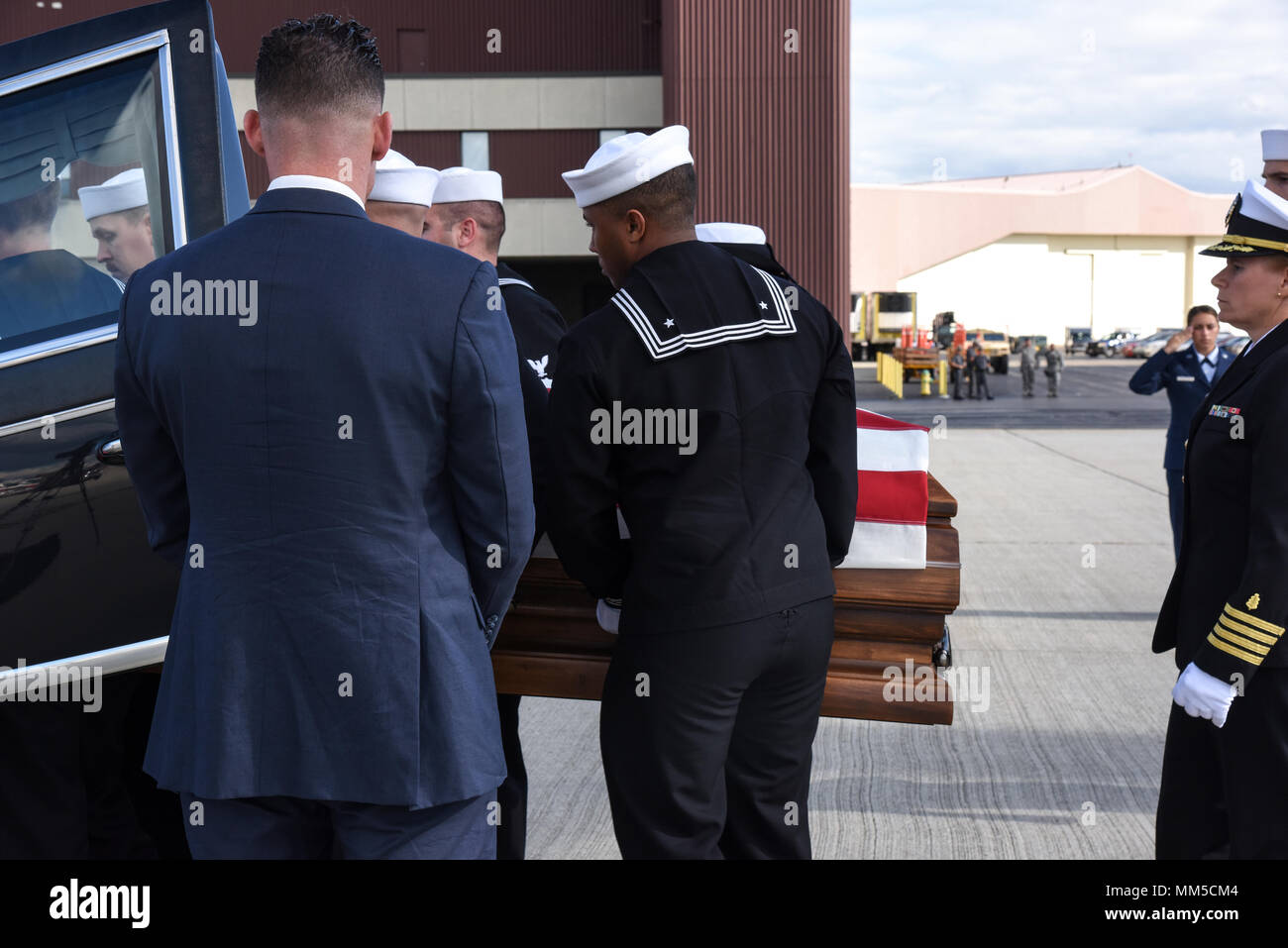 Petty Officer 1st Class Corey Ingram is returned home in a dignified ...