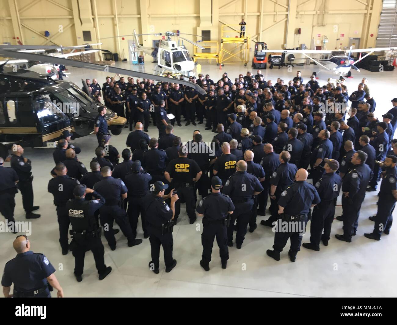 CBP Office of Field Operations Personnel are staged at the Air and ...