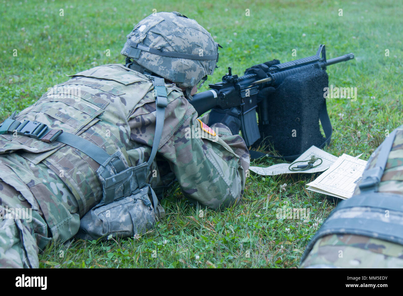 A Vermont Army National Guard Soldier fires his M16 during weapons ...