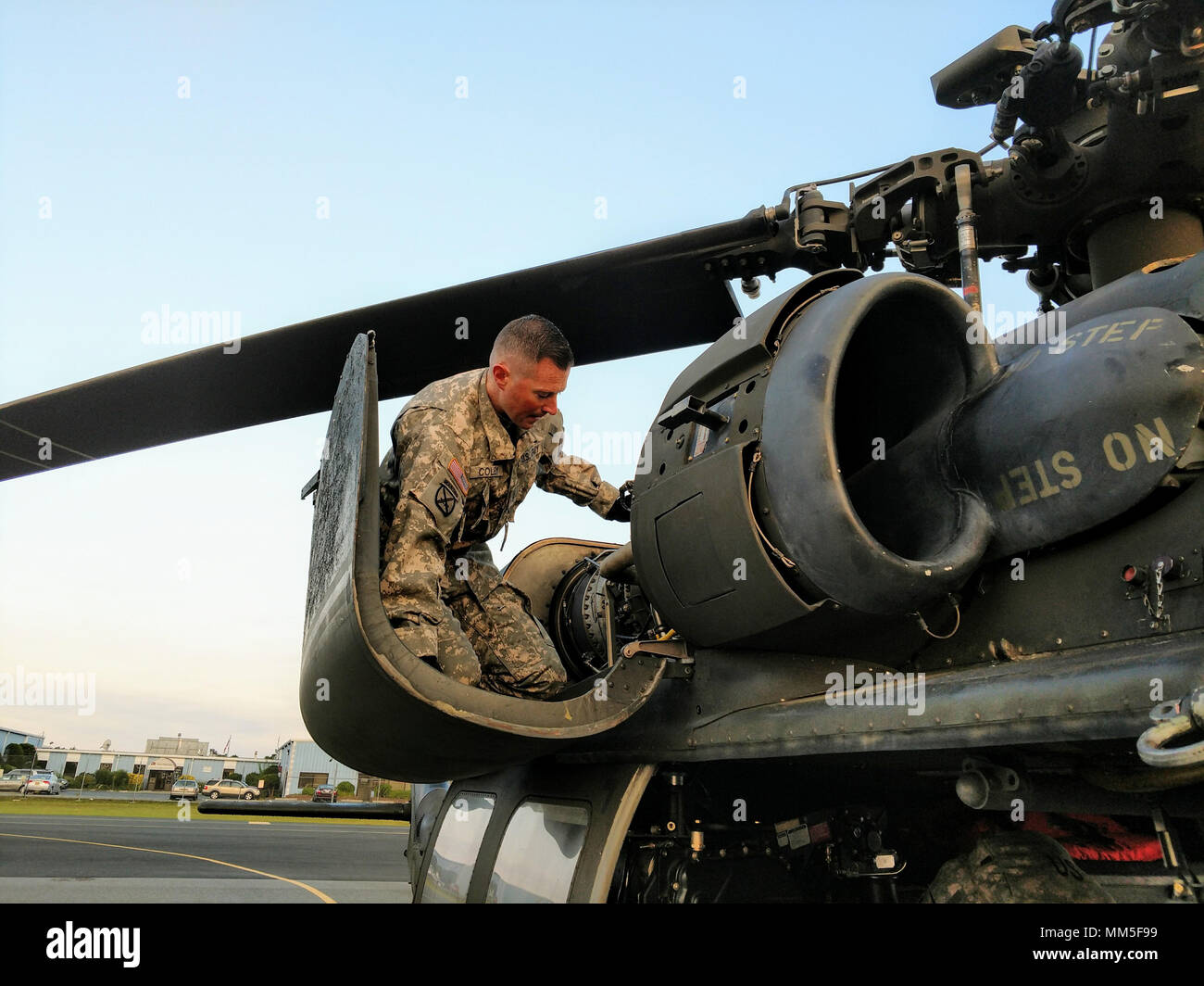 Army Chief Warrant Officer 2 Kevin Colby conducts preflight inspections ...