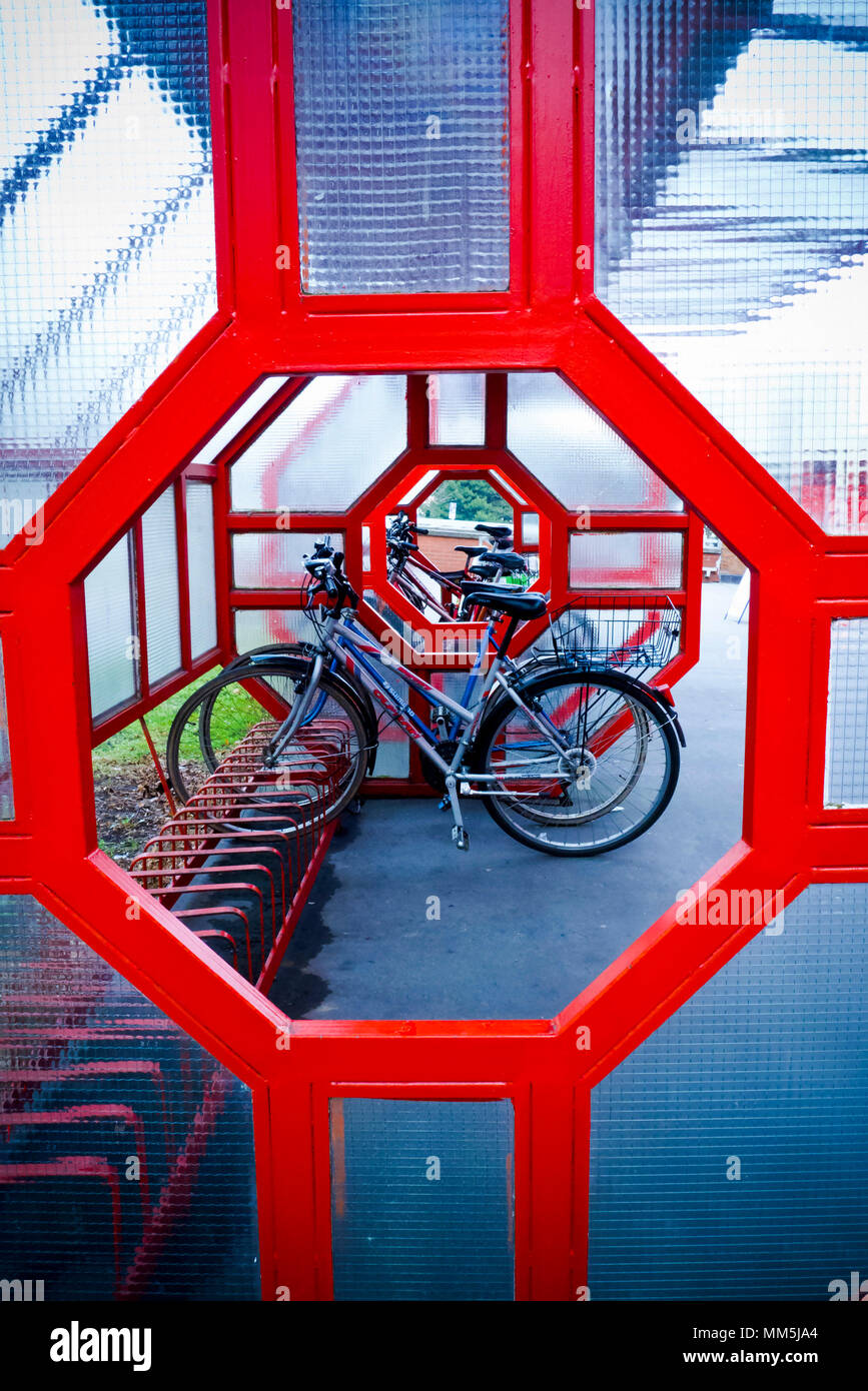 bicycles in a modern bicycles rack parking Stock Photo - Alamy