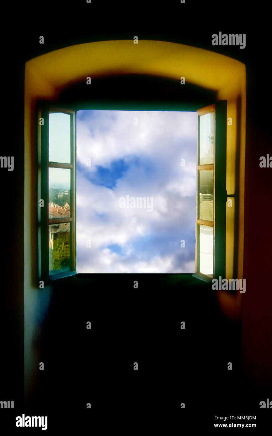 interior with an open window to the blue sky with white clouds Stock ...