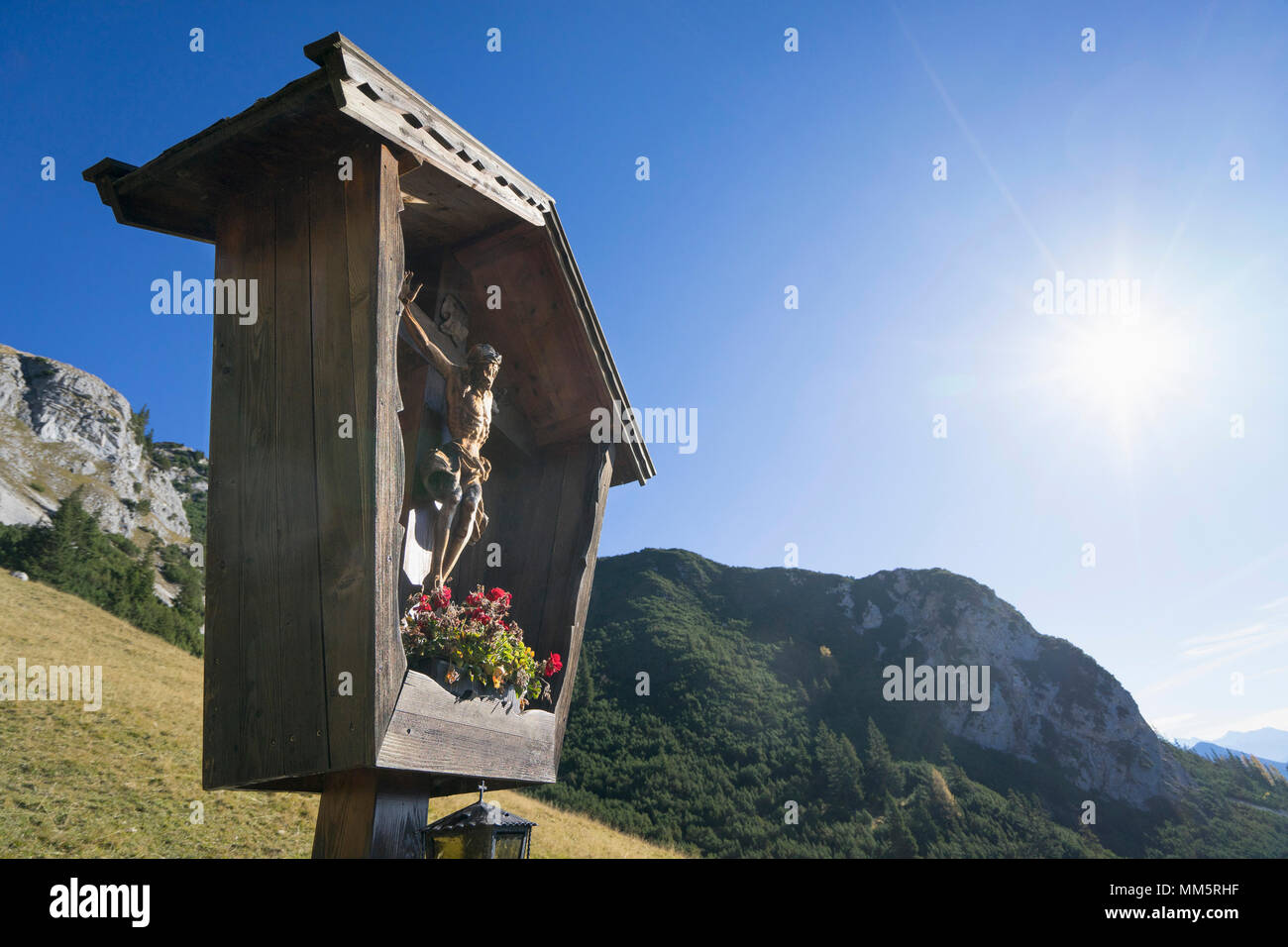 Traditional Jesus crucifix in the mountains, Tyrol, Austria Stock Photo ...