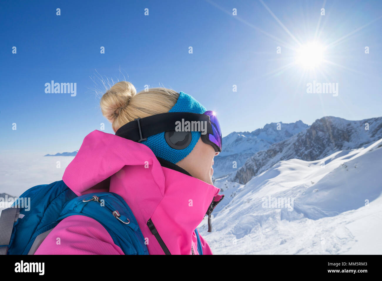 Side view of skier looking at sun, Bavaria, Germany, Europe Stock Photo ...