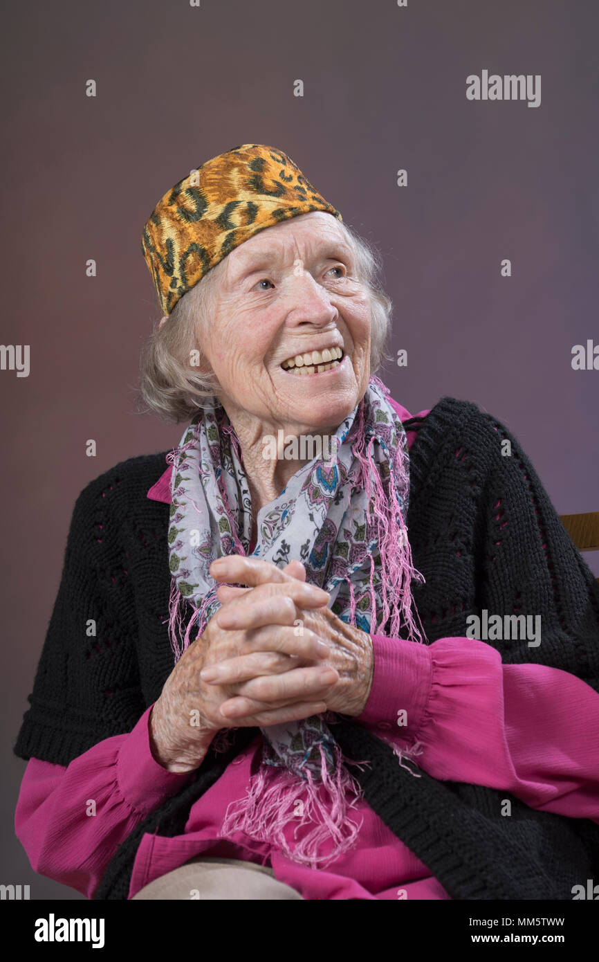 Senior woman in sweater and beret Stock Photo - Alamy