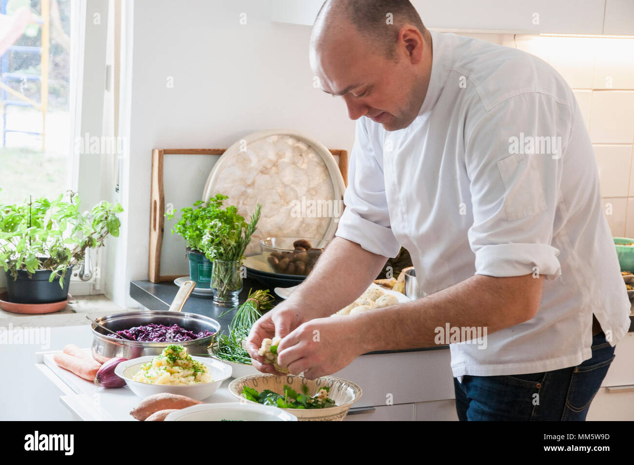 Chef preparing food in the kitchen Stock Photo - Alamy