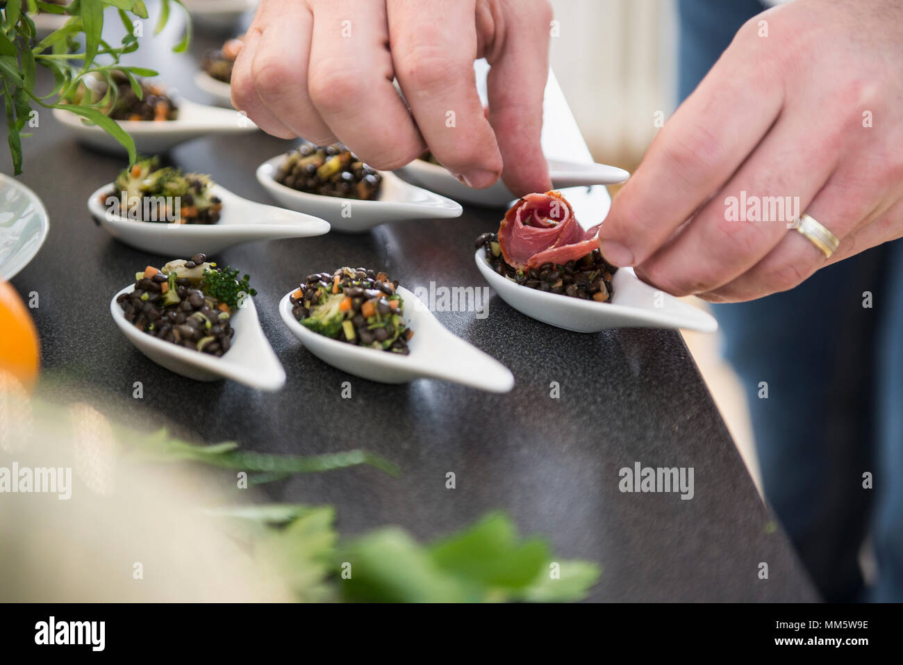 Preparing appetizer hi-res stock photography and images - Alamy