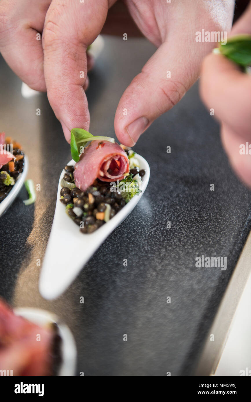 Preparing appetizer hi-res stock photography and images - Alamy