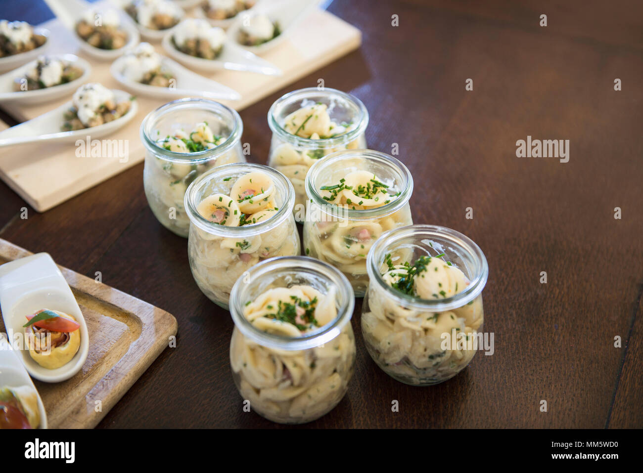 Pasta shells as appetizer in glass jar Stock Photo - Alamy