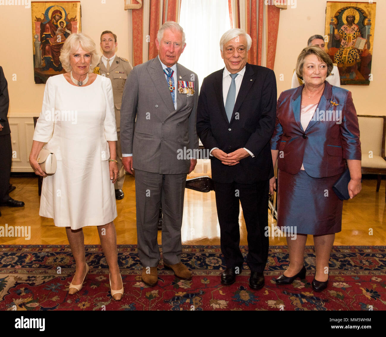 The Prince of Wales and the Duchess of Cornwall (left) meeting ...
