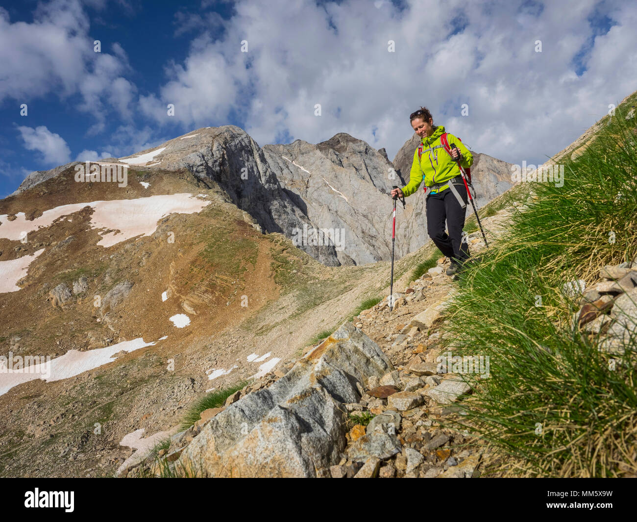 Woman hiking in the High Pyrenees, mount Vignemale, Cauterets, France ...