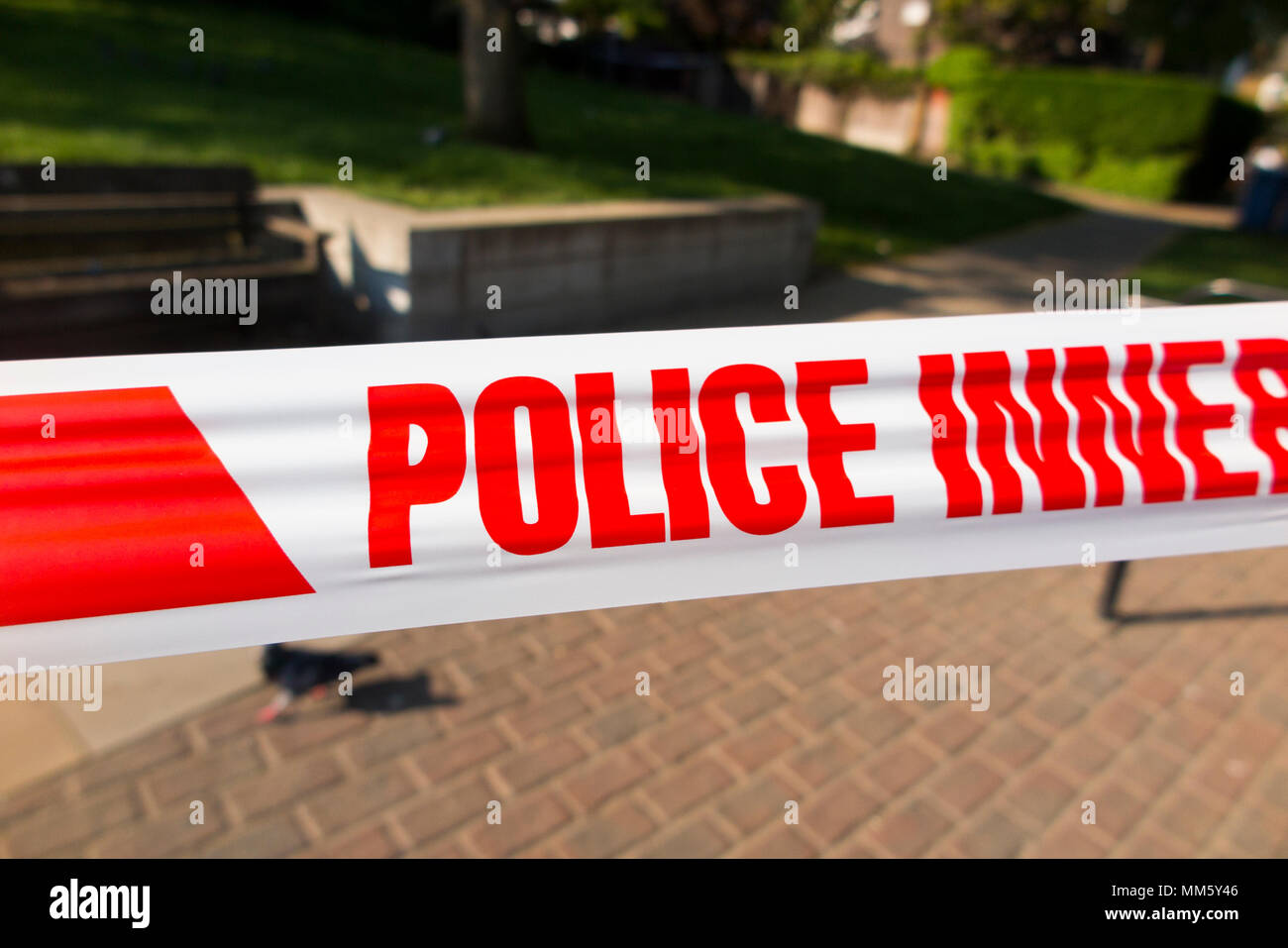 Inner cordon tape barrier placed by police or scene of crime officer ...