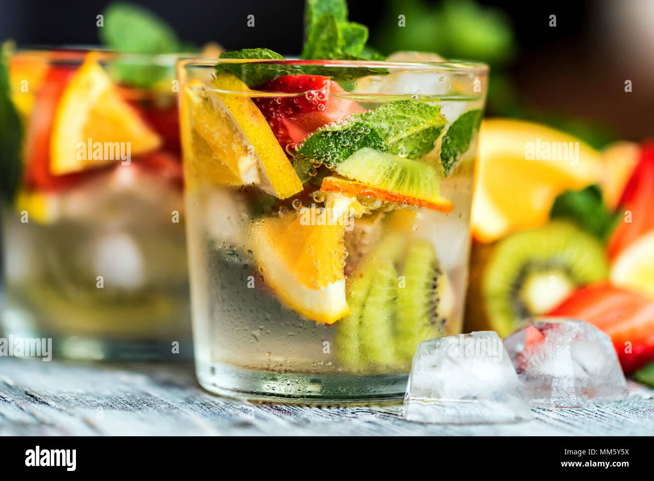 Homemade lemonade with fruit and mint Stock Photo - Alamy